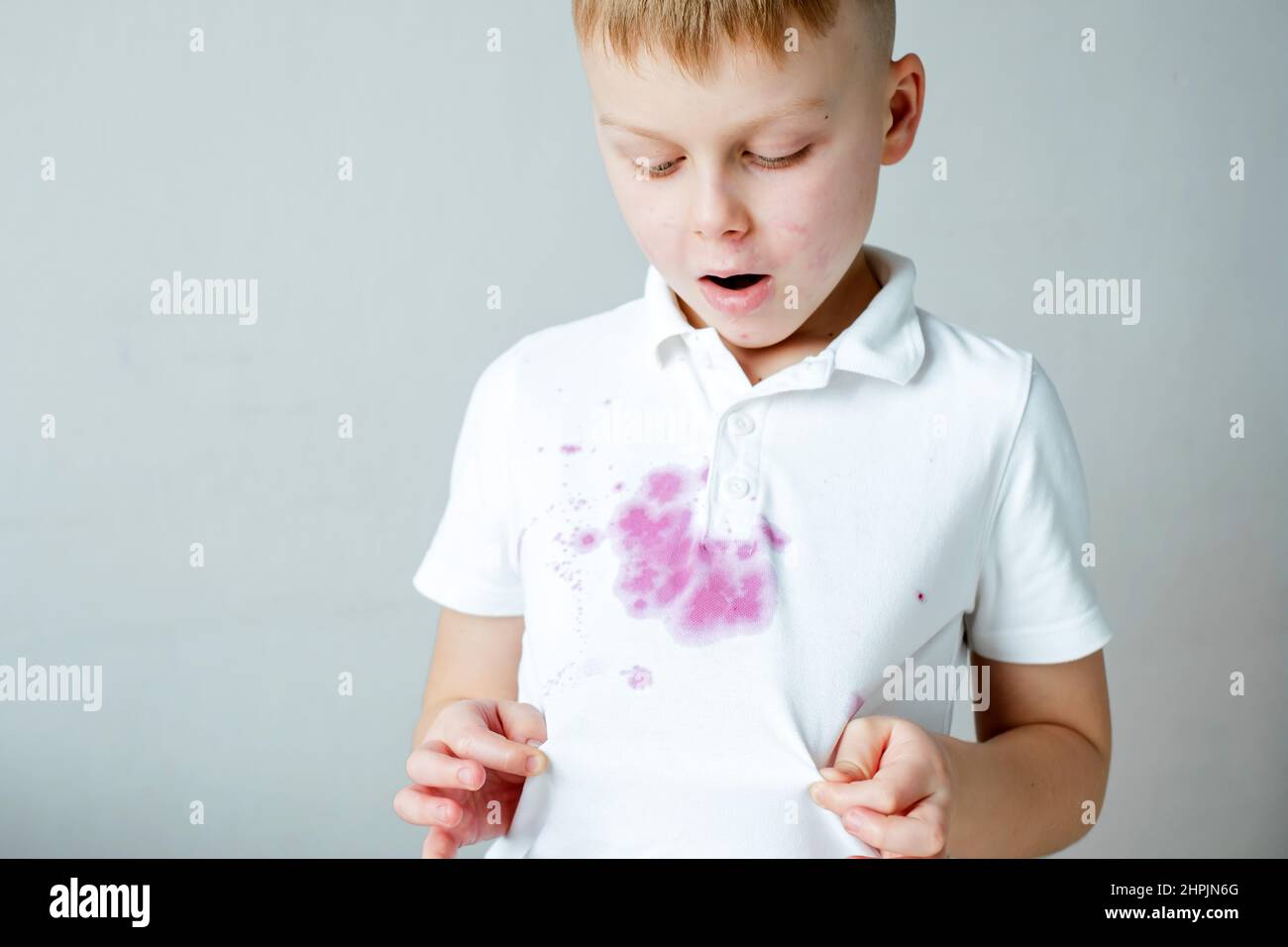 Wet paint on clothes hi-res stock photography and images - Alamy