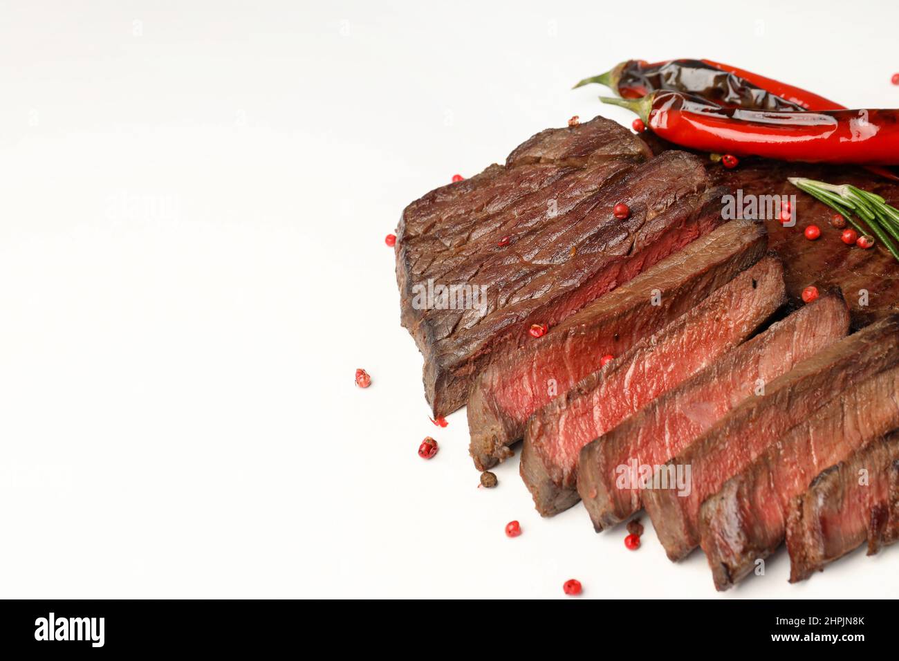 Roasted beef steaks on white background, space for text Stock Photo - Alamy