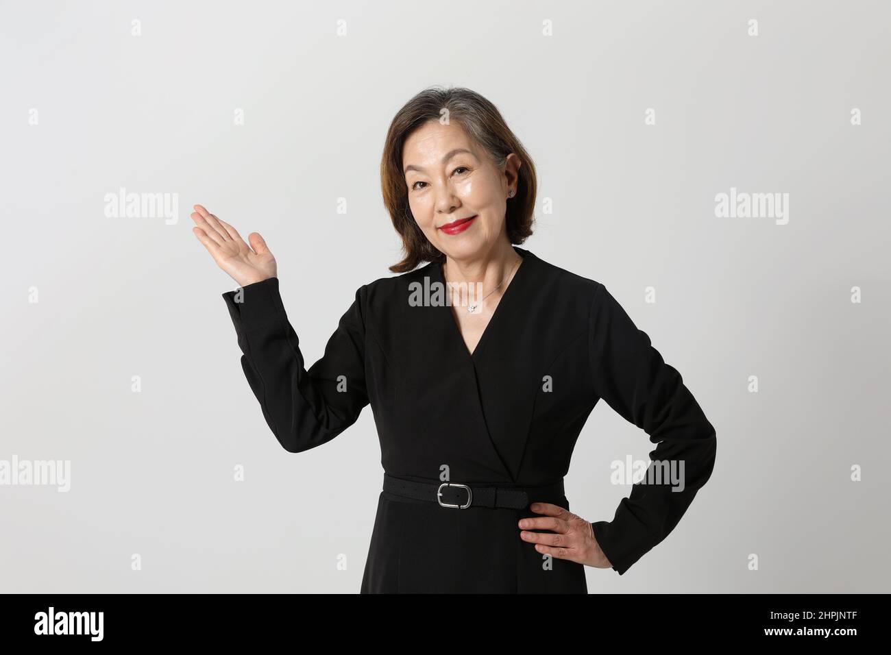 fashionable Asian Korean senior woman, with hand motions Stock Photo ...