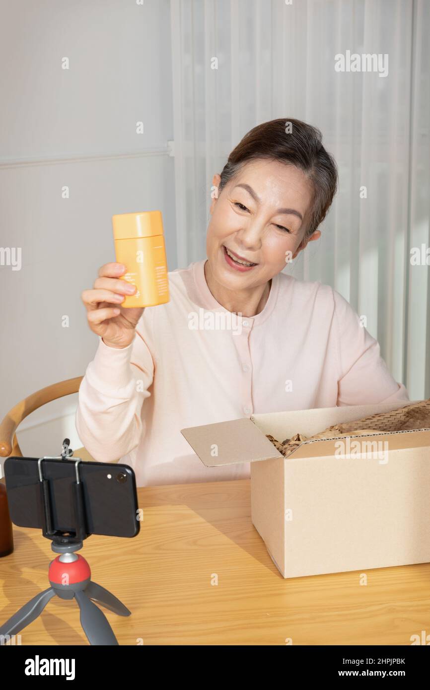 Asian Korean senior woman beauty creator, influencer, vlogger concept ...