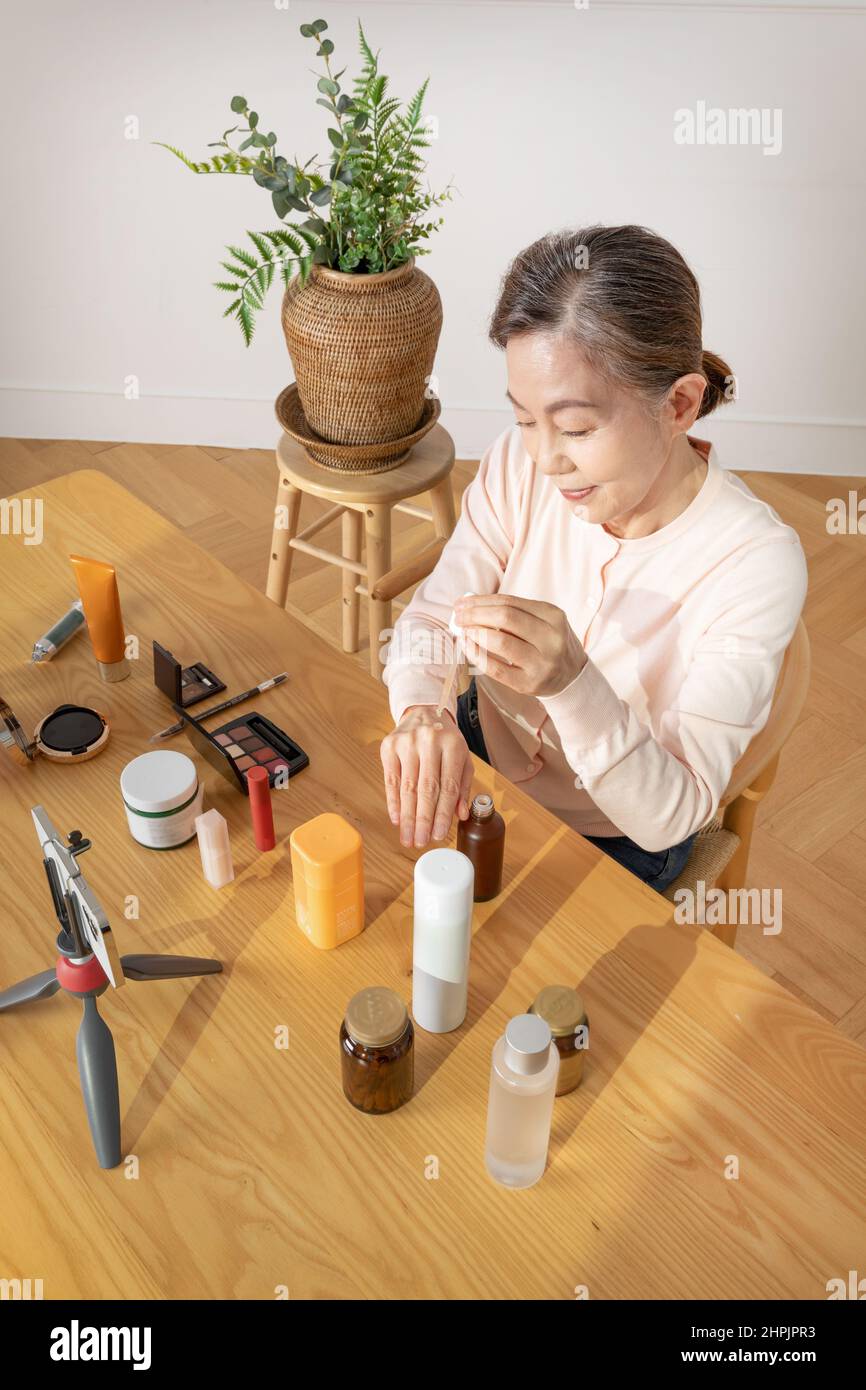 Asian Korean senior woman beauty creator, influencer, vlogger concept ...
