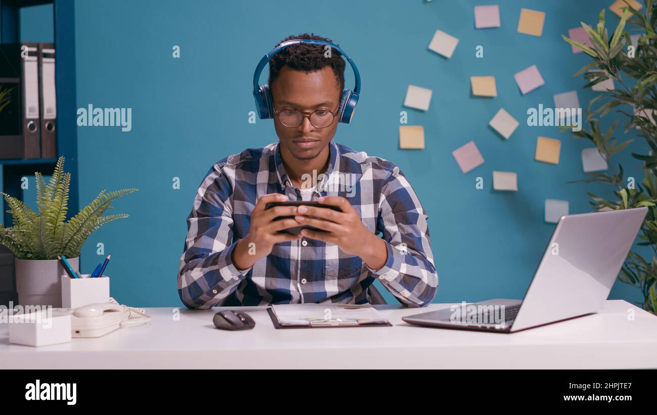Upset player losing online video games on smartphone, using digital ...