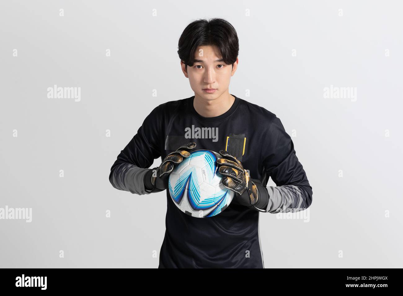 soccer football sports player, asian korean man with motions in studio ...