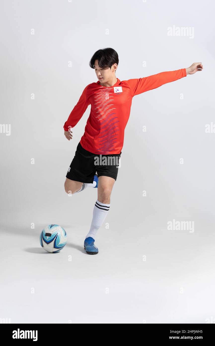soccer football sports player, asian korean man with motions in studio ...