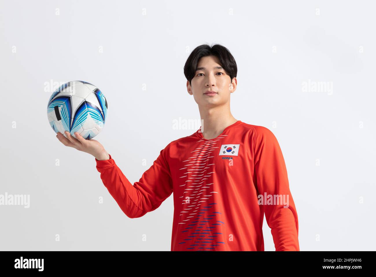 soccer football sports player, asian korean man with motions in studio ...