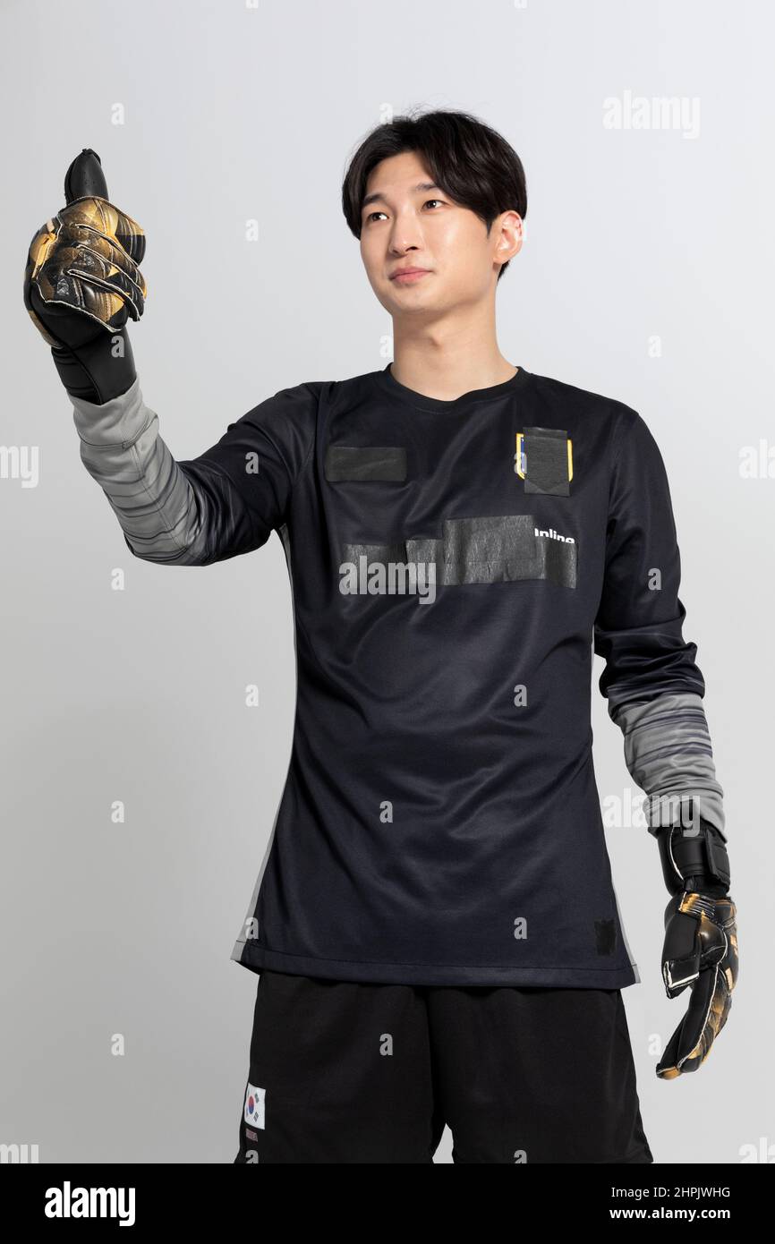 soccer football sports player, asian korean man with motions in studio ...