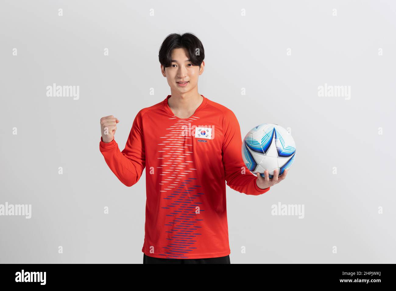 soccer football sports player, asian korean man with motions in studio ...
