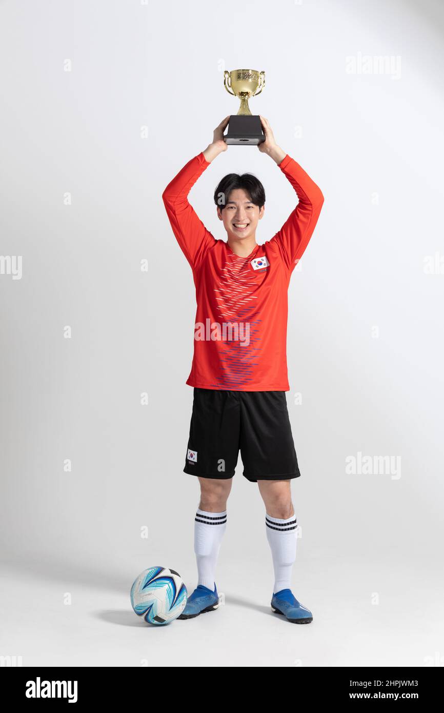 soccer football sports player, asian korean man with motions in studio ...