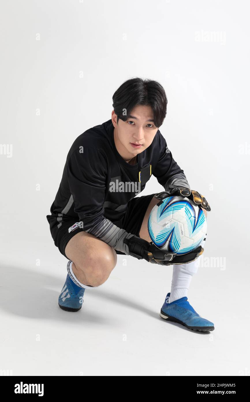 soccer football sports player, asian korean man with motions in studio ...