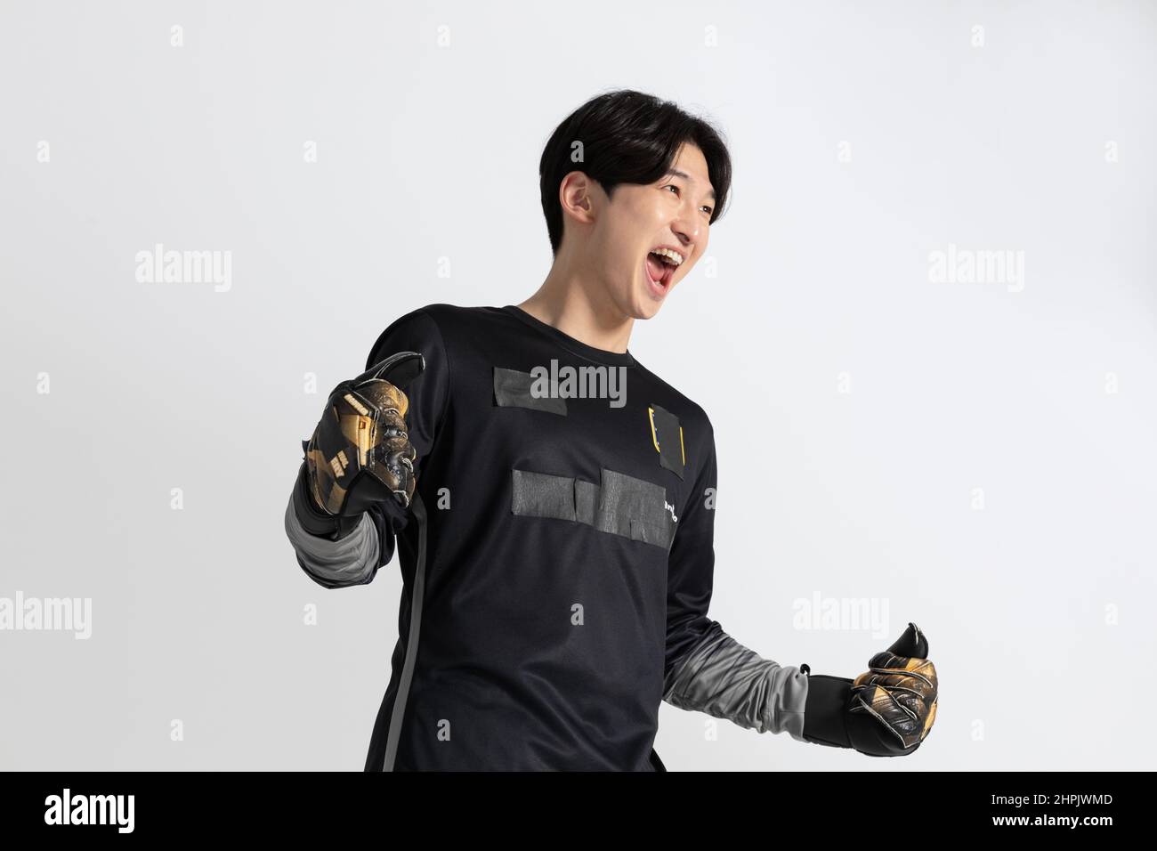 soccer football sports player, asian korean man with motions in studio ...