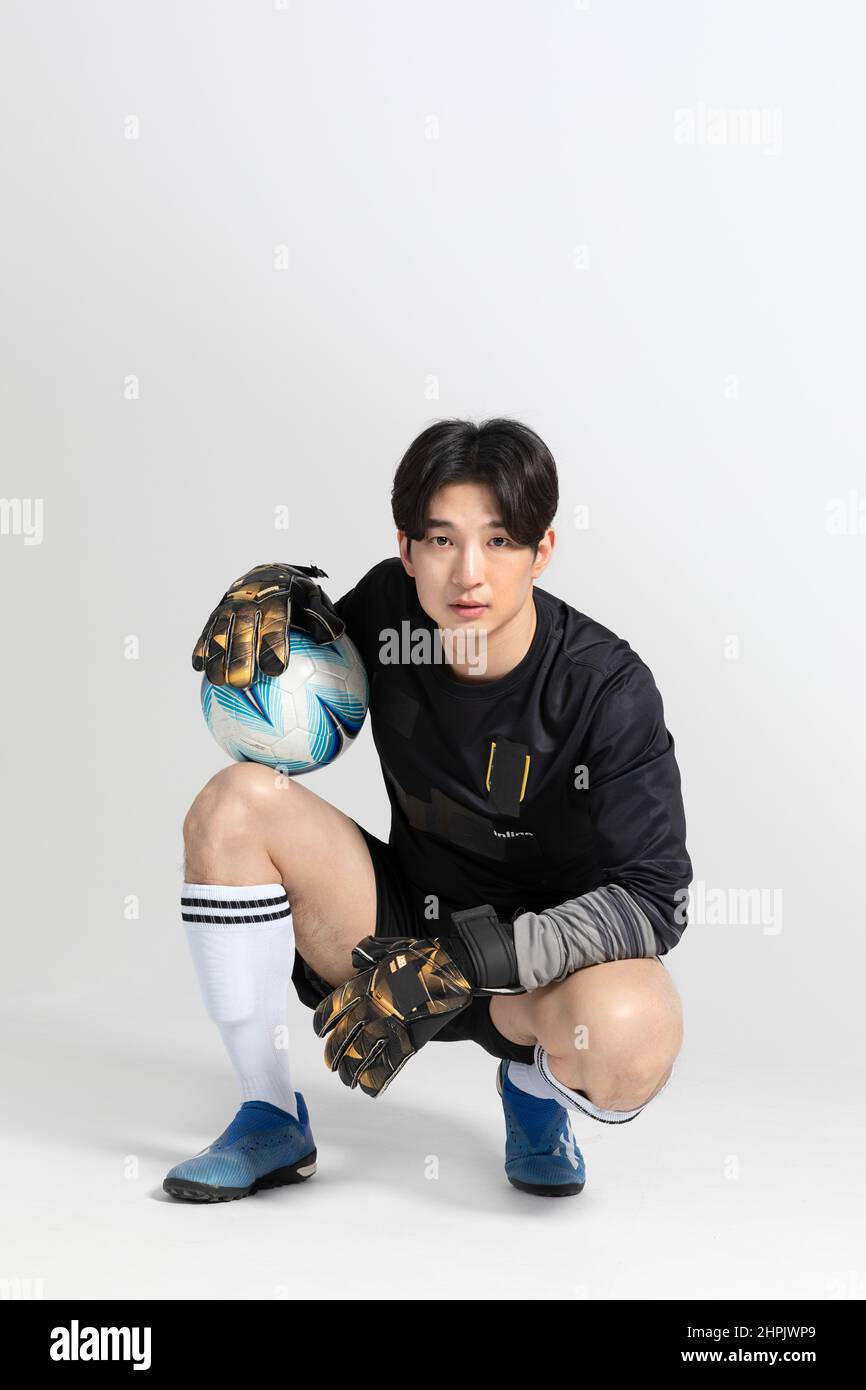 soccer football sports player, asian korean man with motions in studio ...