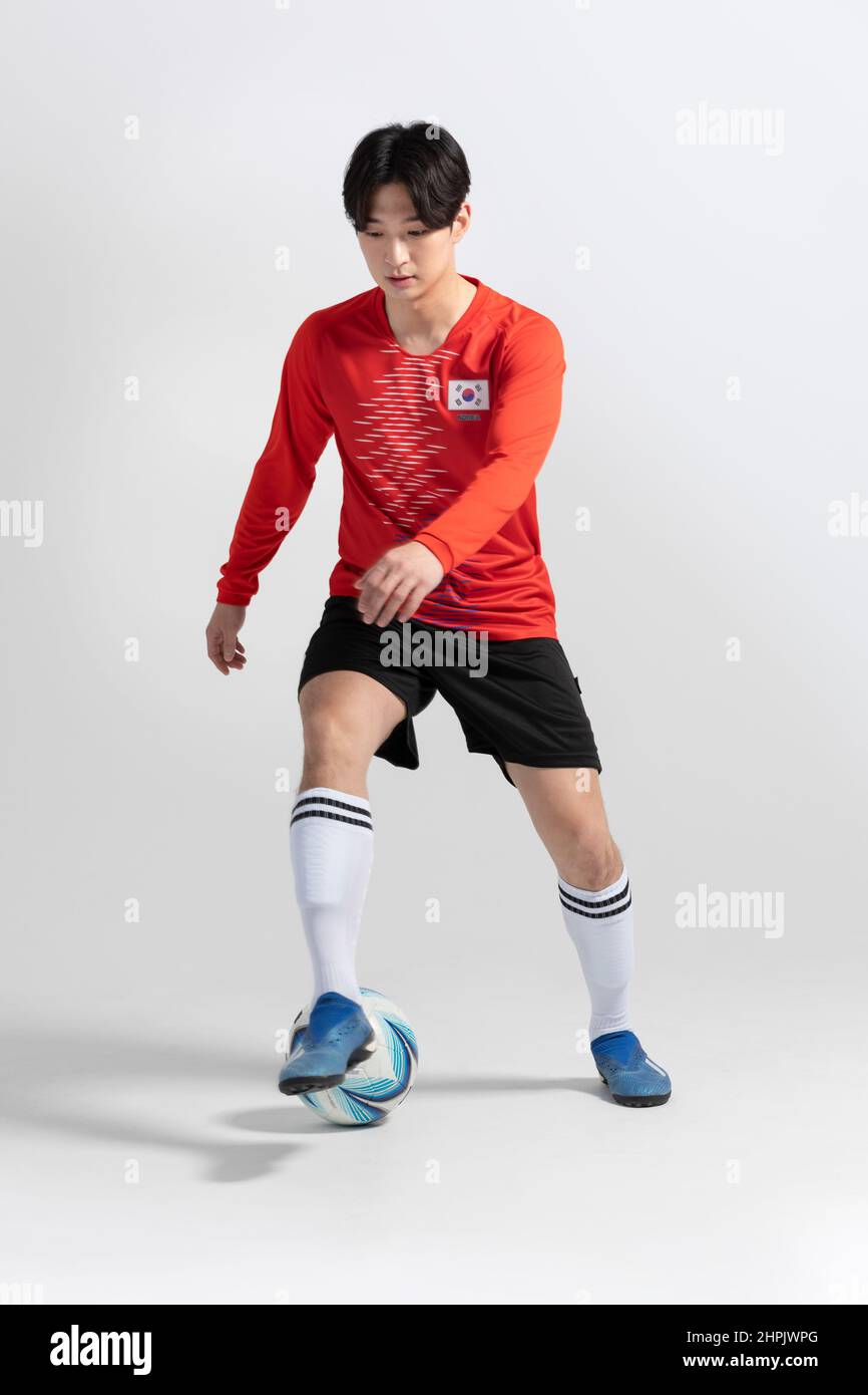 soccer football sports player, asian korean man with motions in studio ...
