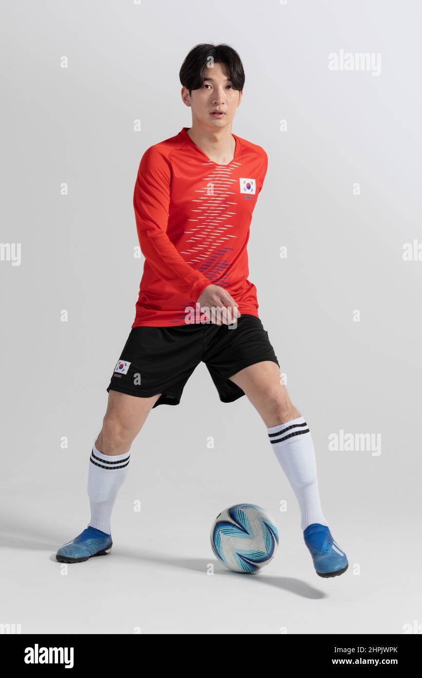 soccer football sports player, asian korean man with motions in studio ...