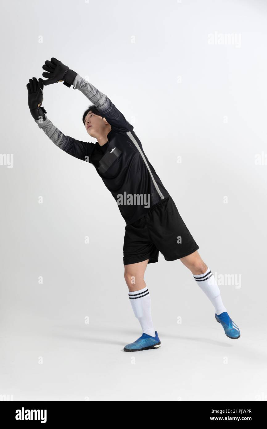 soccer football sports player, asian korean man with motions in studio ...