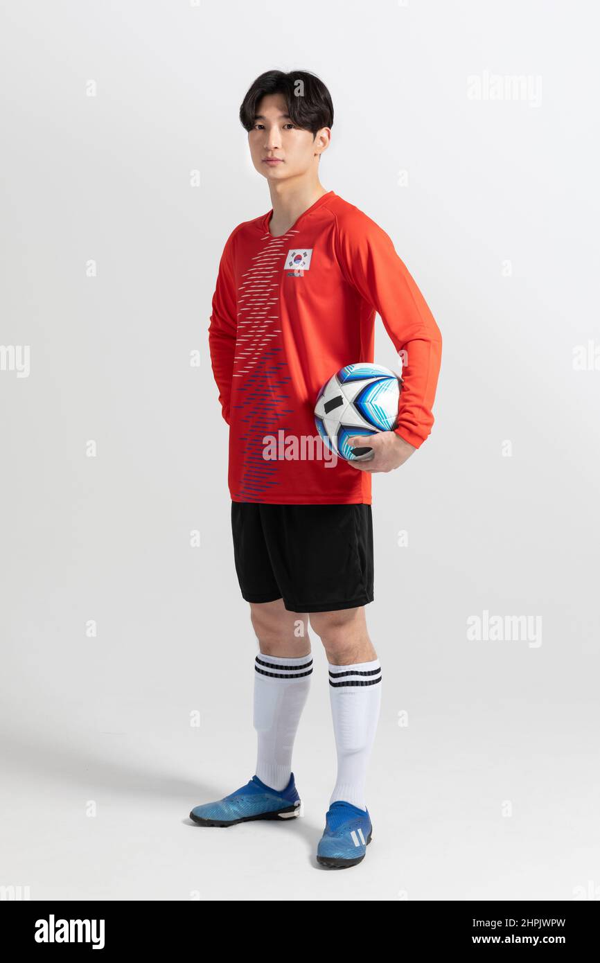 soccer football sports player, asian korean man with motions in studio ...