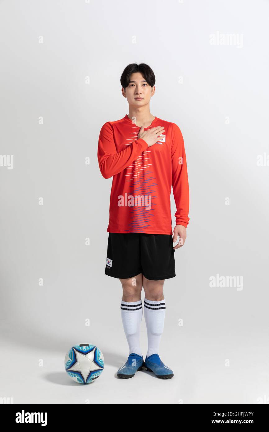 soccer football sports player, asian korean man with motions in studio ...