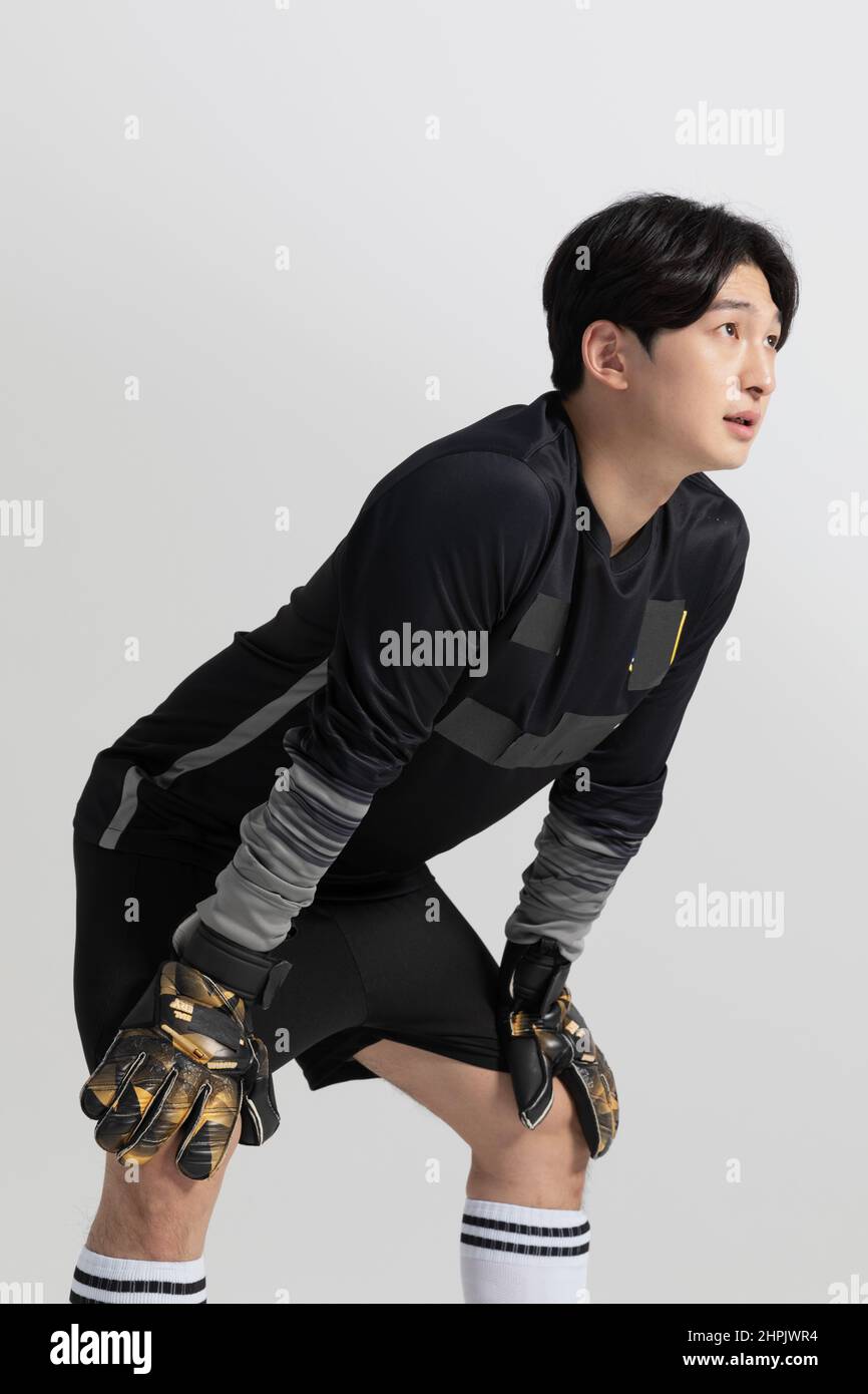 soccer football sports player, asian korean man with motions in studio ...