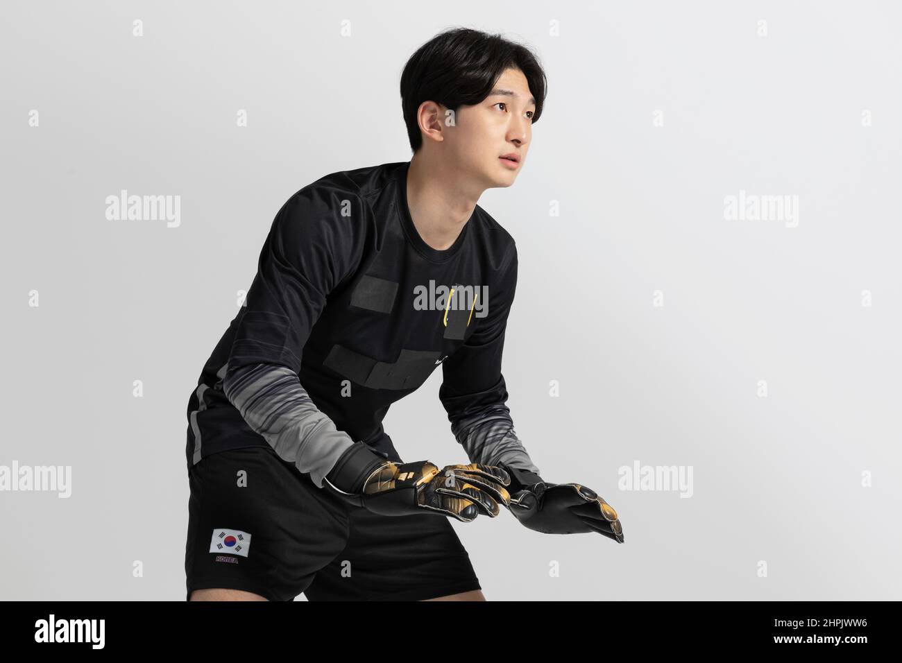 soccer football sports player, asian korean man with motions in studio ...