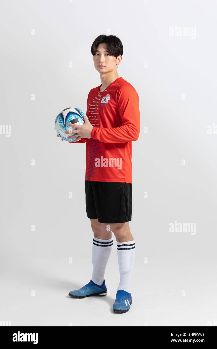 soccer football sports player, asian korean man with motions in studio ...