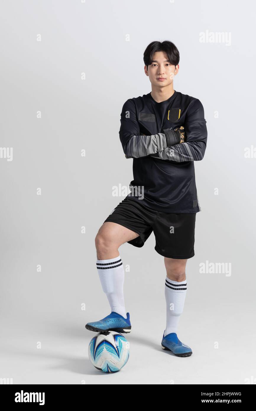 soccer football sports player, asian korean man with motions in studio ...