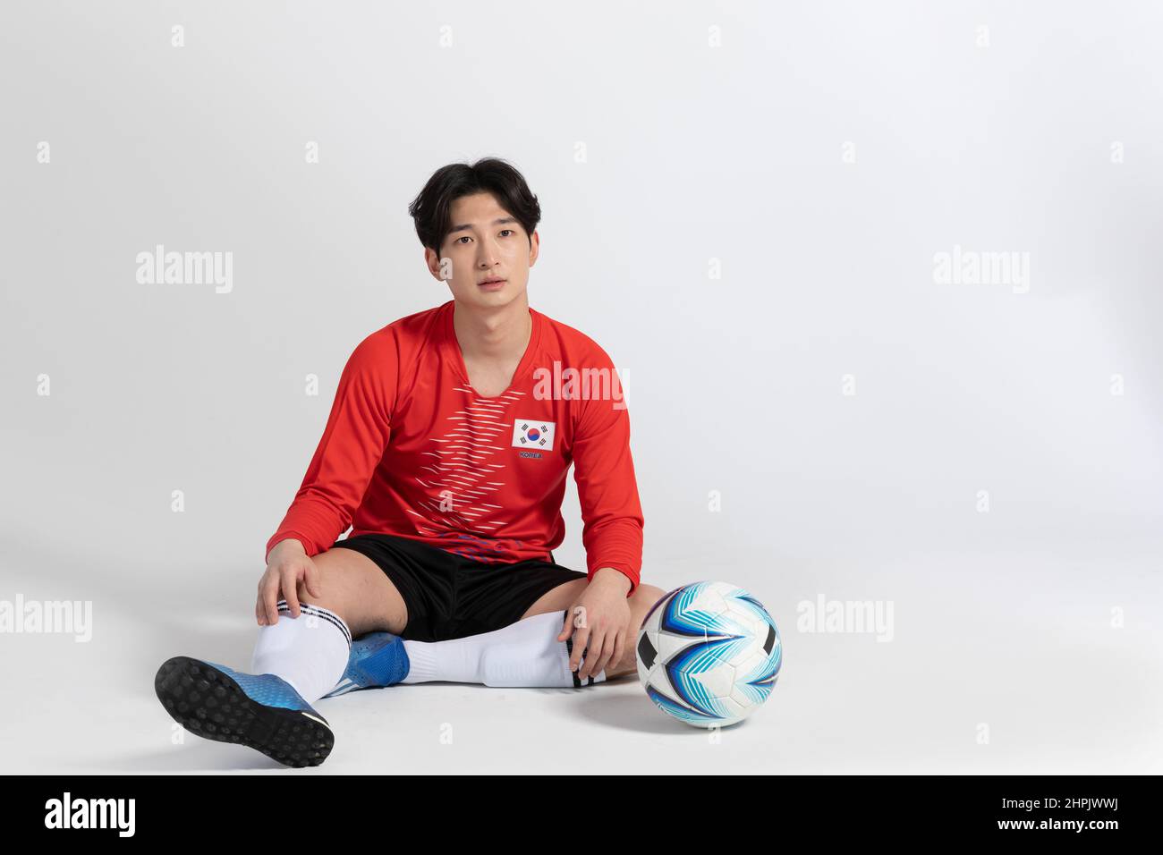 soccer football sports player, asian korean man with motions in studio ...