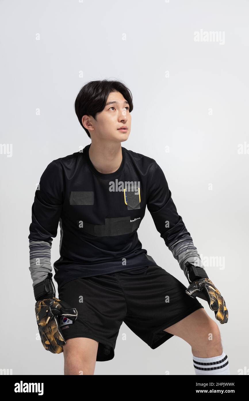 soccer football sports player, asian korean man with motions in studio ...