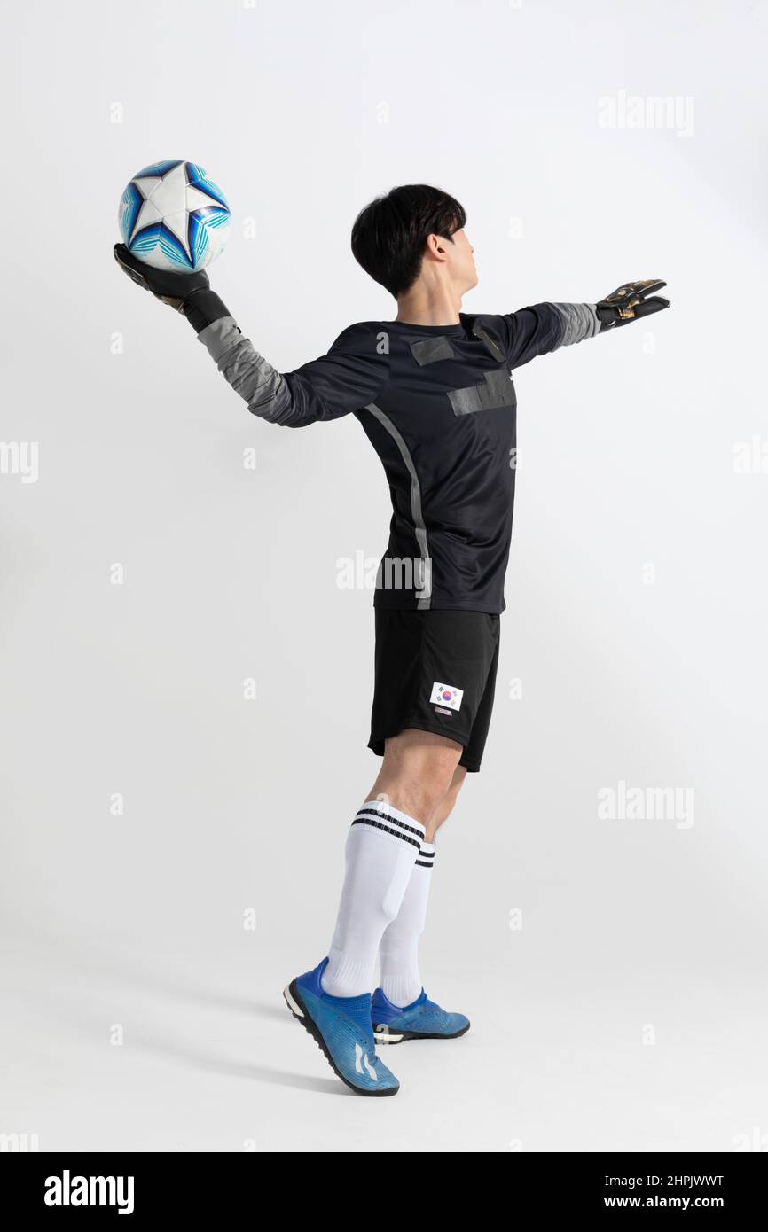 soccer football sports player, asian korean man with motions in studio ...