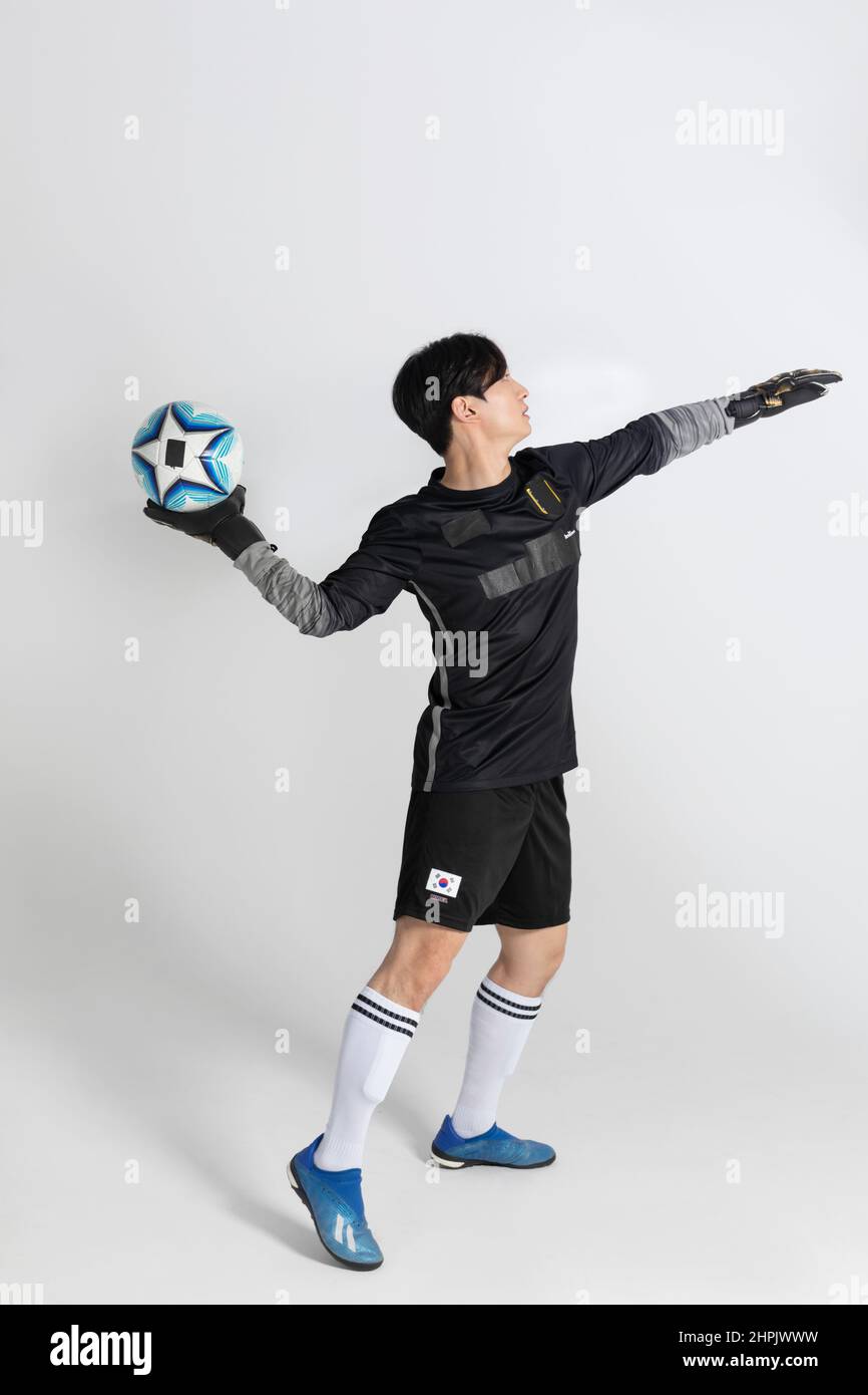 soccer football sports player, asian korean man with motions in studio ...