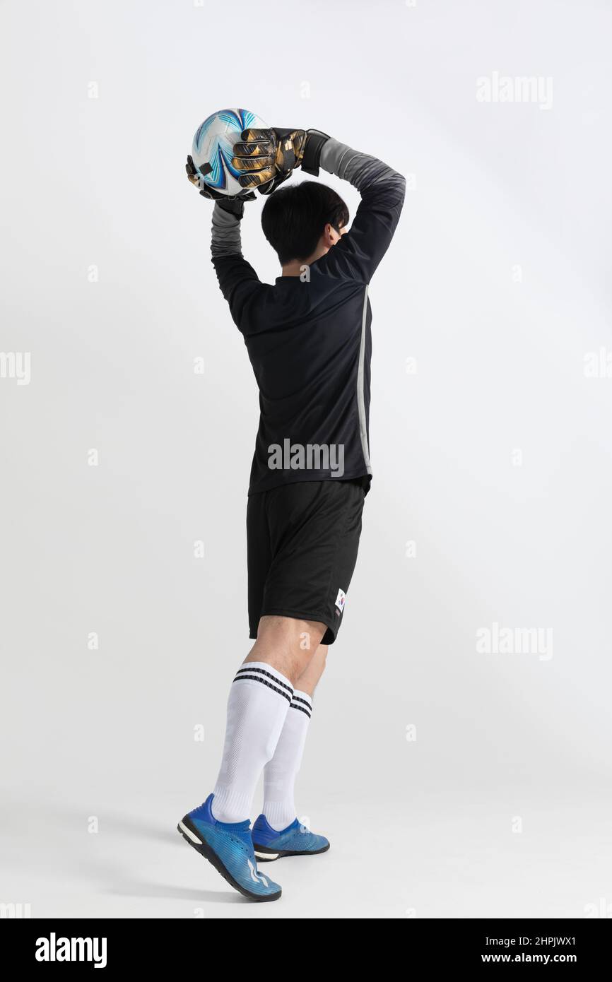 soccer football sports player, asian korean man with motions in studio ...