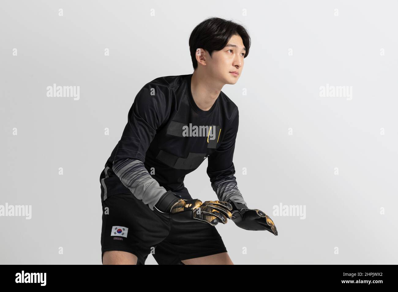 soccer football sports player, asian korean man with motions in studio ...