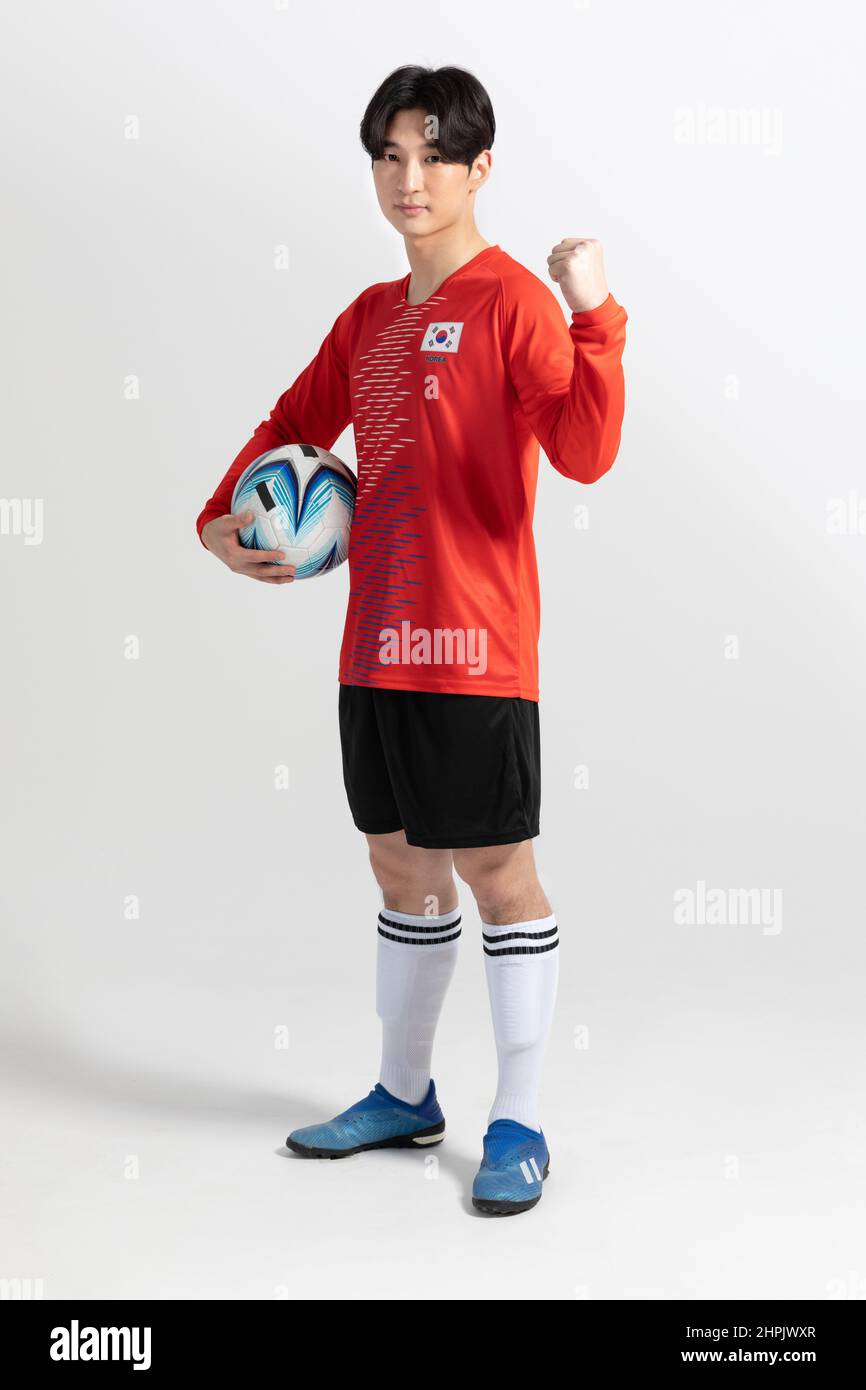 soccer football sports player, asian korean man with motions in studio ...