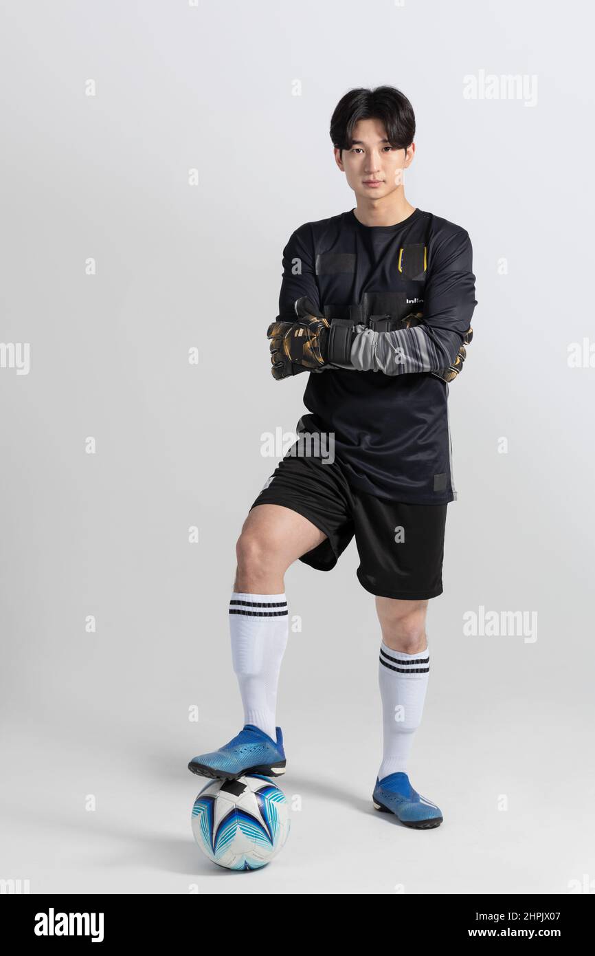 soccer football sports player, asian korean man with motions in studio ...