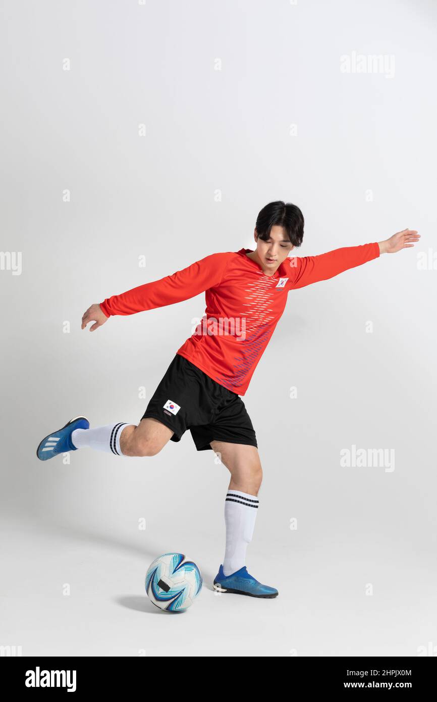soccer football sports player, asian korean man with motions in studio ...