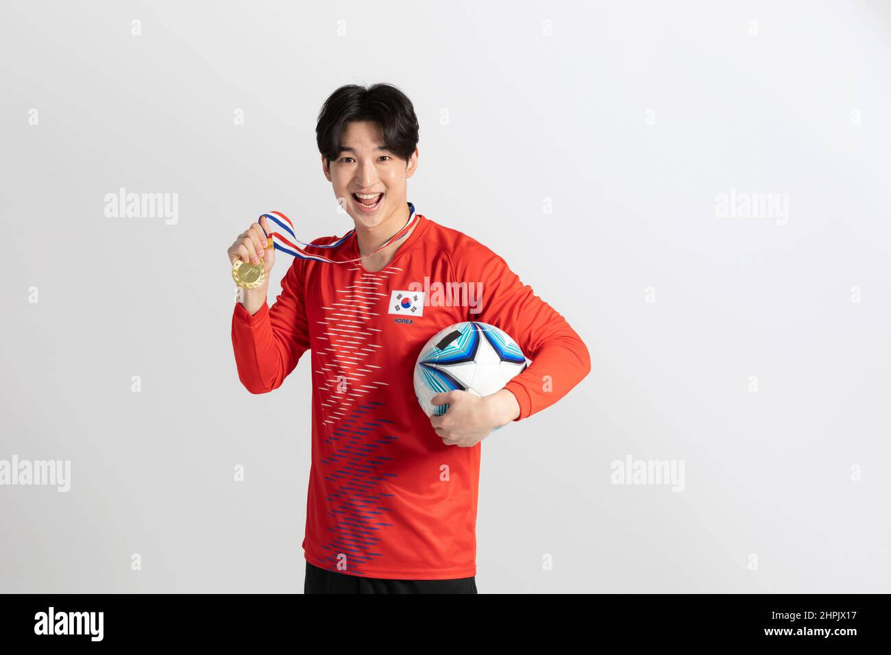 soccer football sports player, asian korean man with motions in studio ...