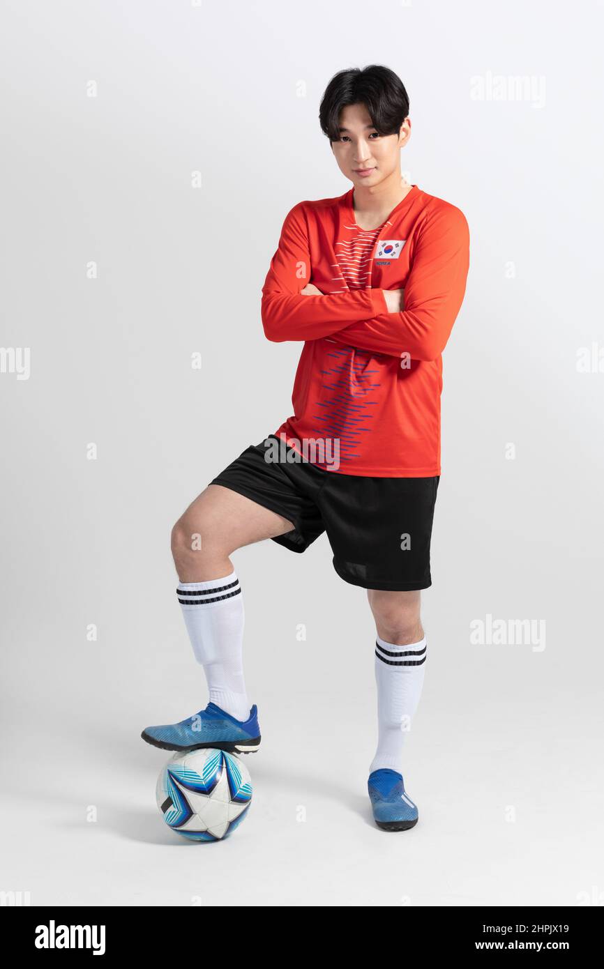 soccer football sports player, asian korean man with motions in studio ...