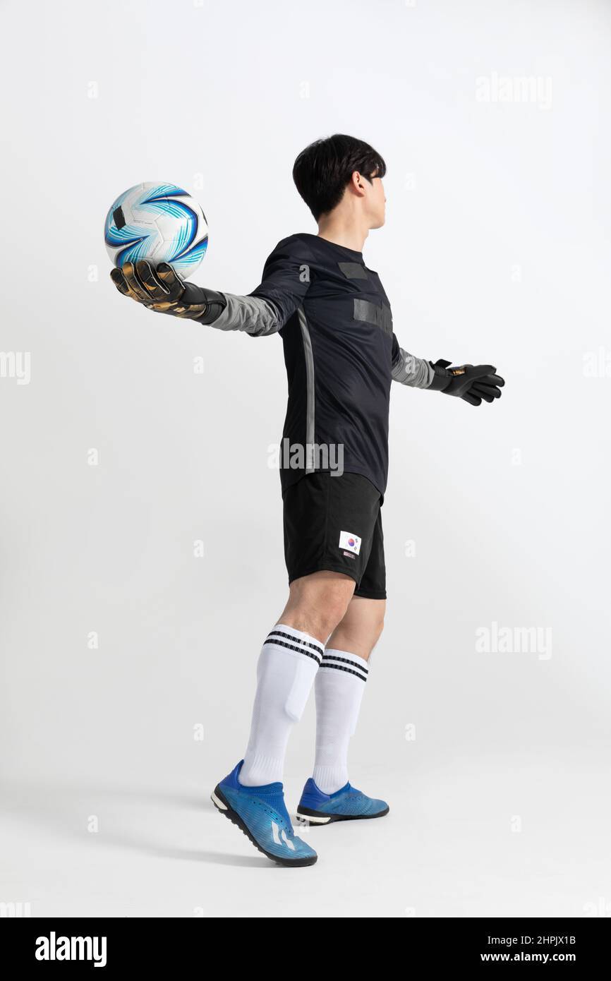 soccer football sports player, asian korean man with motions in studio ...