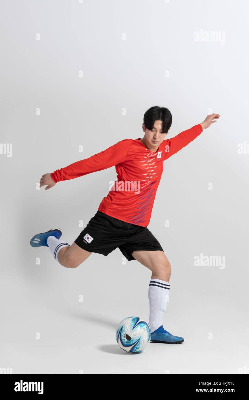 soccer football sports player, asian korean man with motions in studio ...