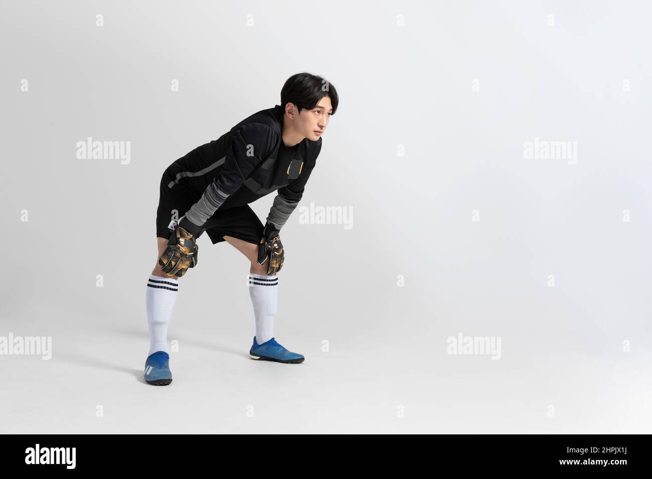 soccer football sports player, asian korean man with motions in studio ...