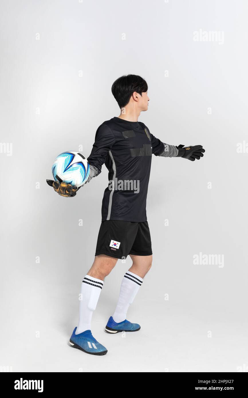 soccer football sports player, asian korean man with motions in studio ...