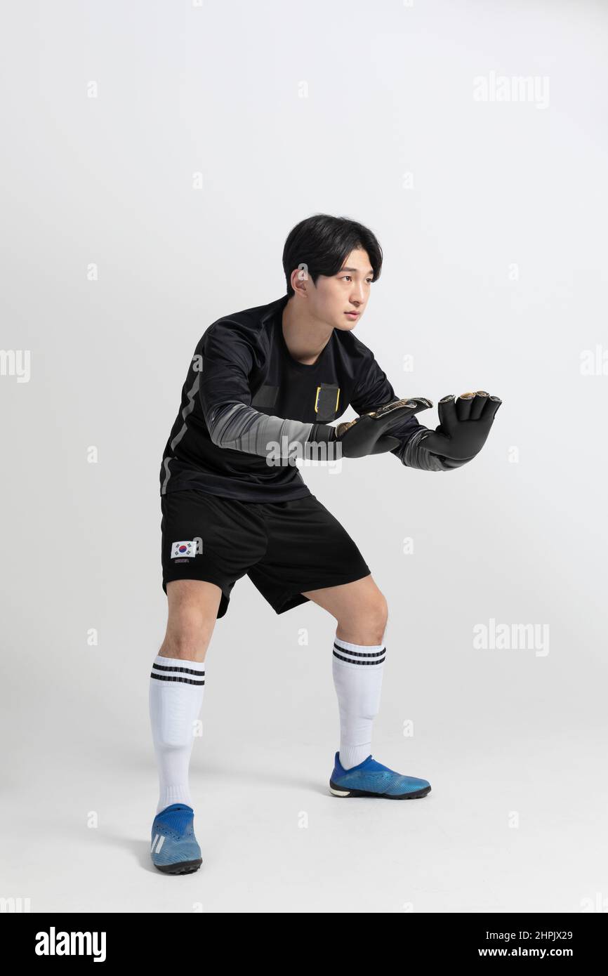 soccer football sports player, asian korean man with motions in studio ...