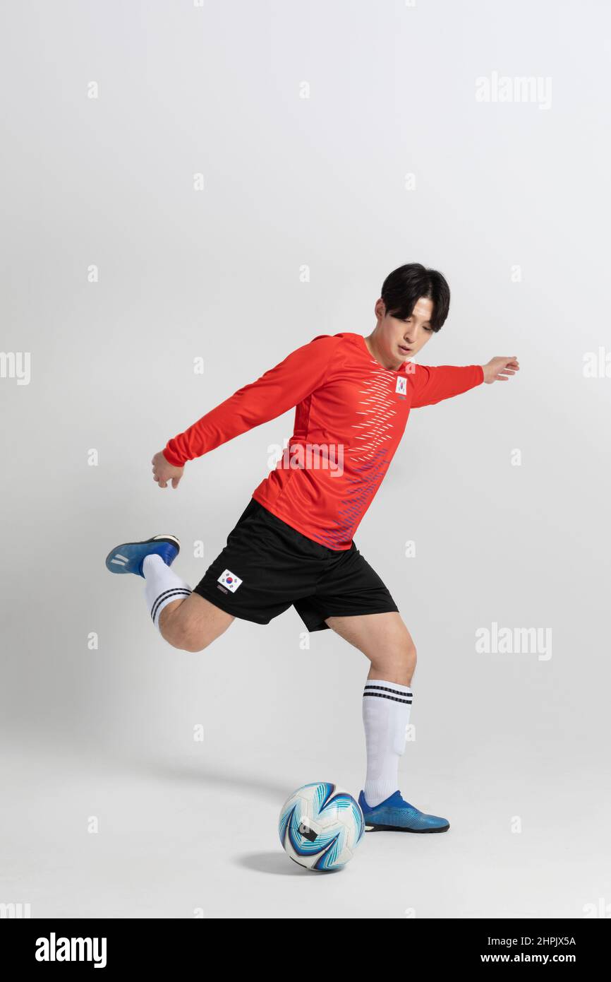 soccer football sports player, asian korean man with motions in studio ...