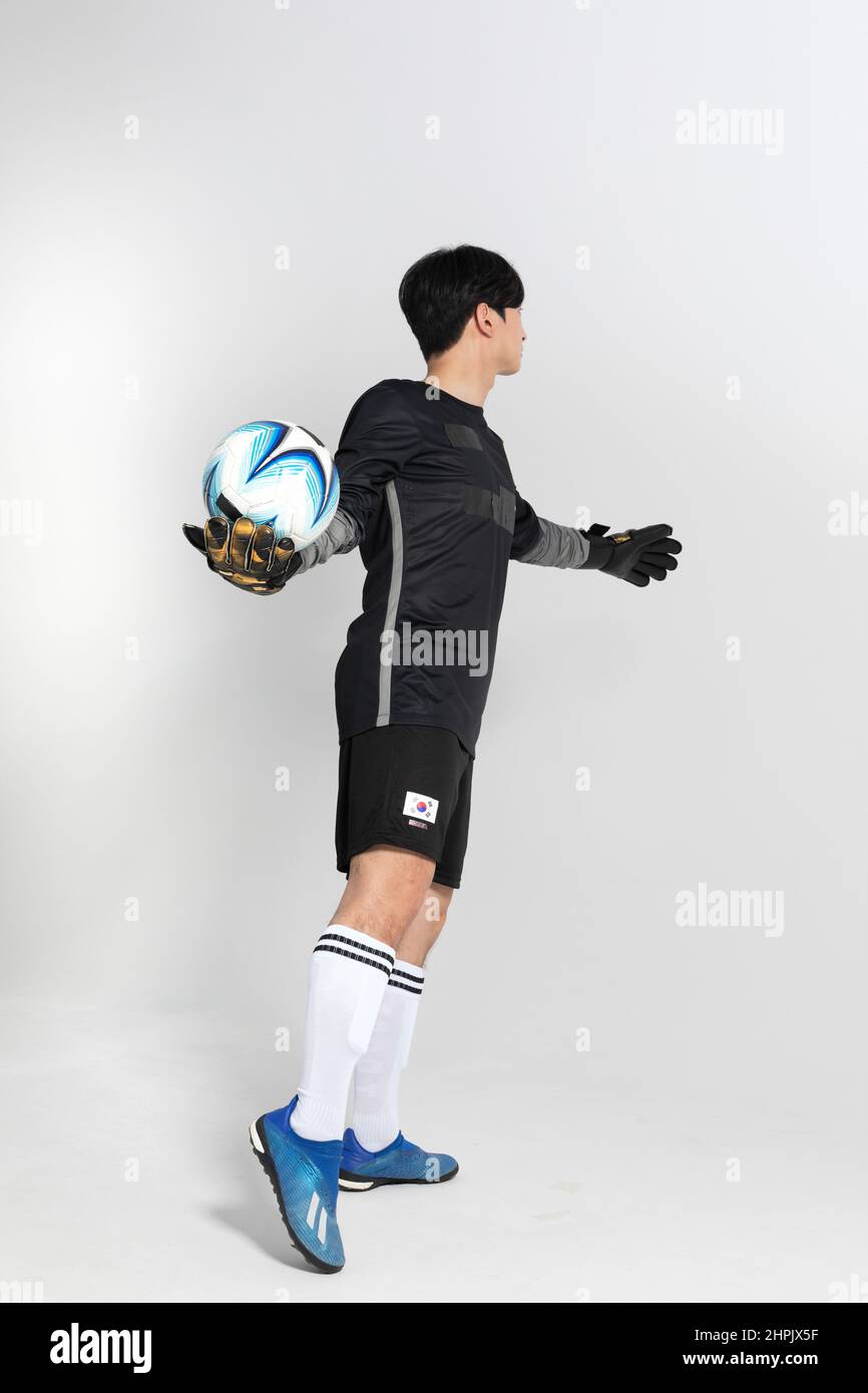 soccer football sports player, asian korean man with motions in studio ...