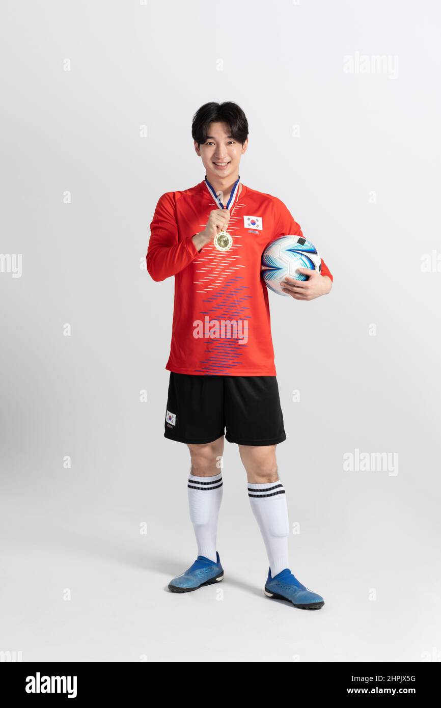 soccer football sports player, asian korean man with motions in studio ...