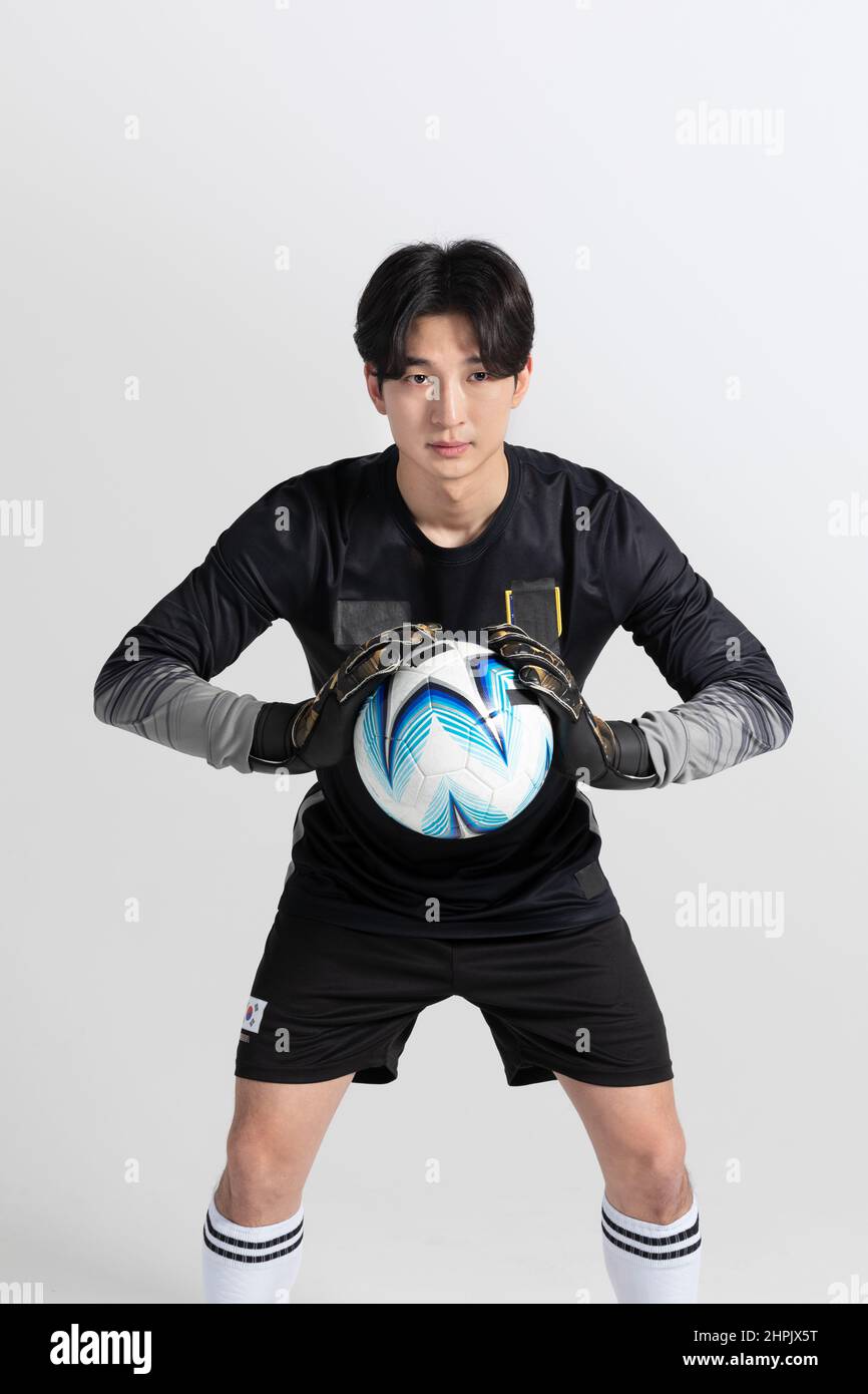 soccer football sports player, asian korean man with motions in studio ...
