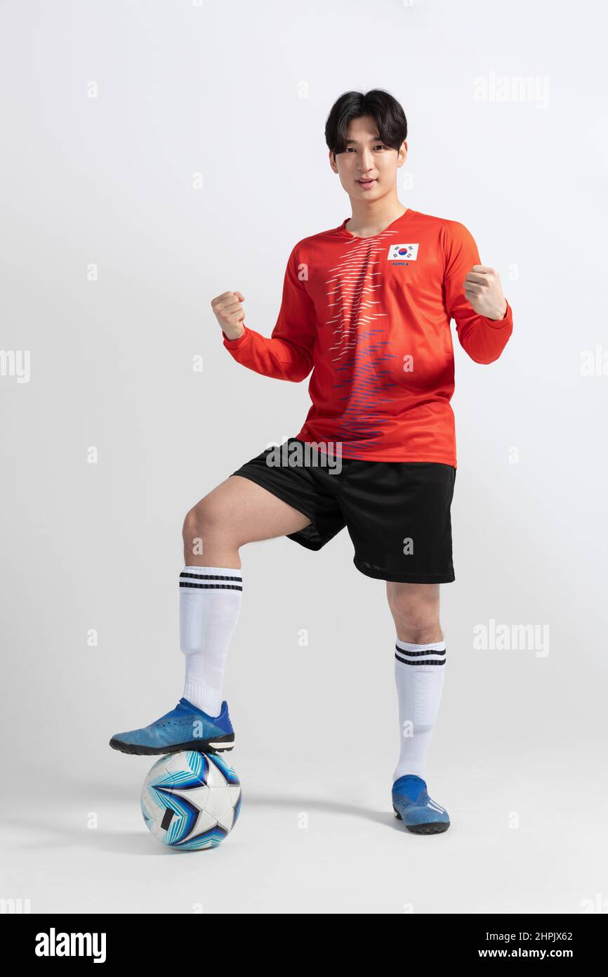 soccer football sports player, asian korean man with motions in studio ...