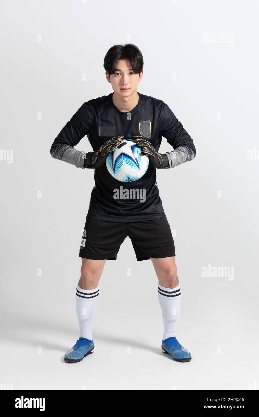 soccer football sports player, asian korean man with motions in studio ...