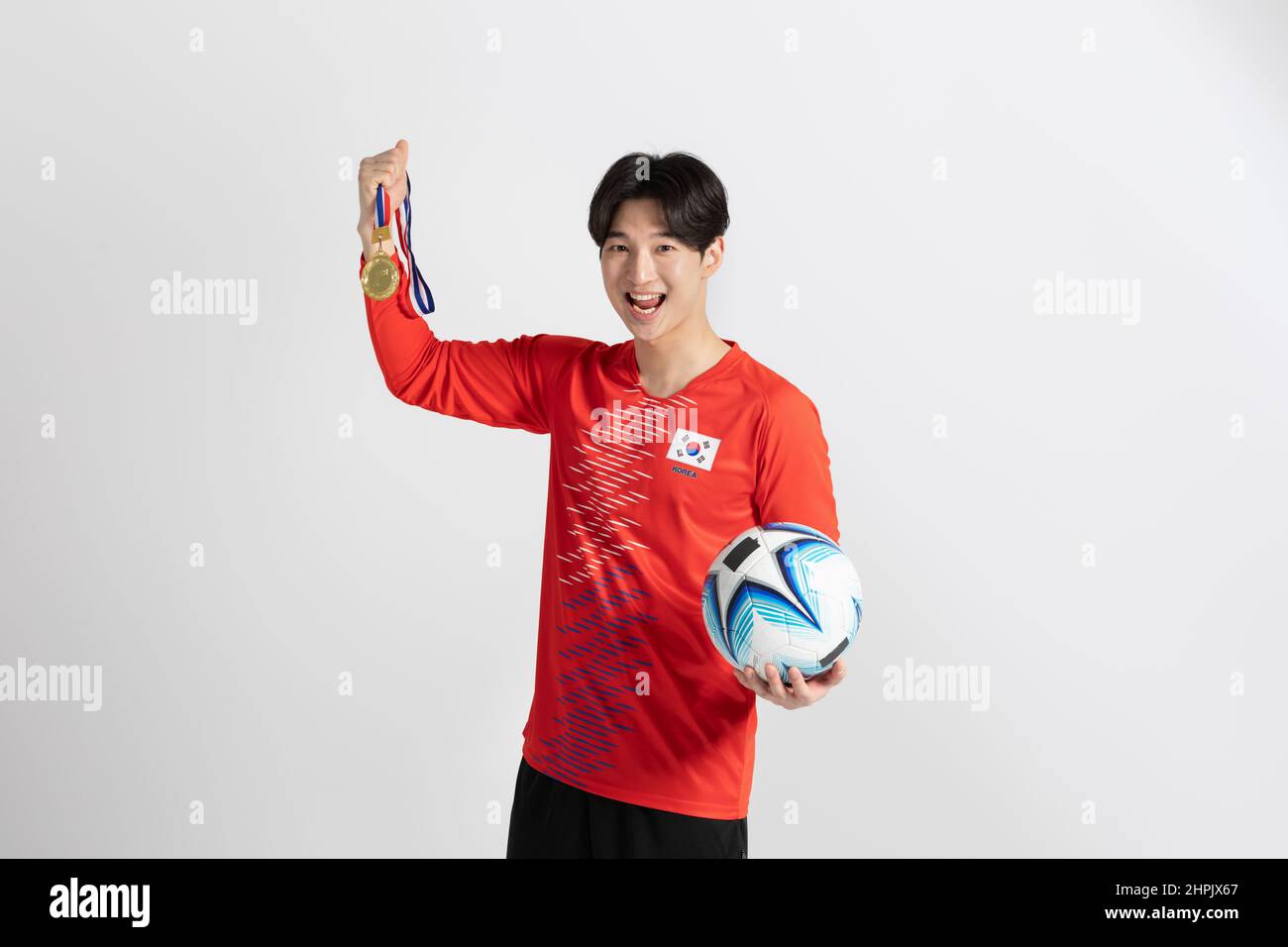 soccer football sports player, asian korean man with motions in studio ...