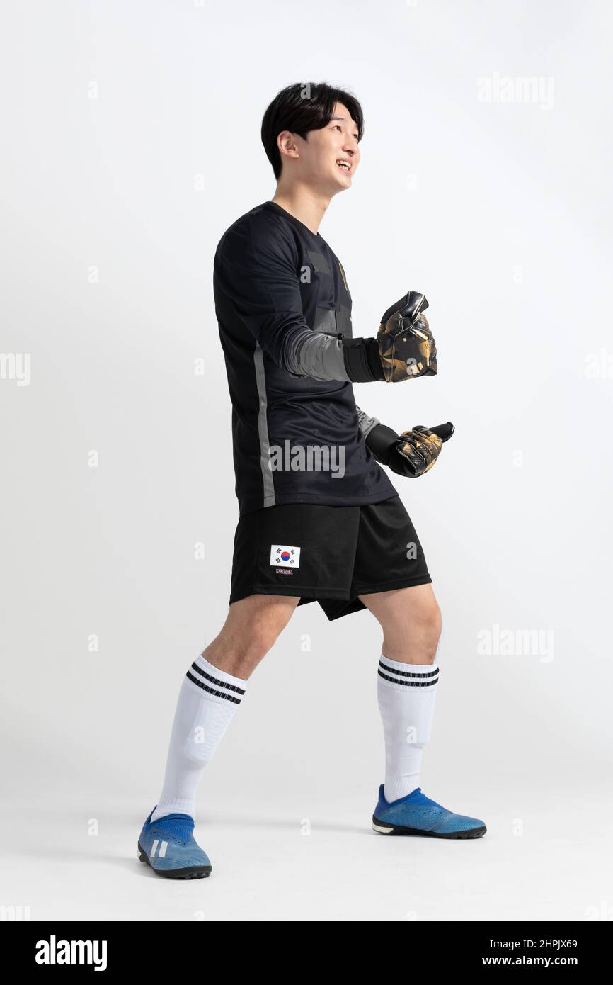 soccer football sports player, asian korean man with motions in studio ...