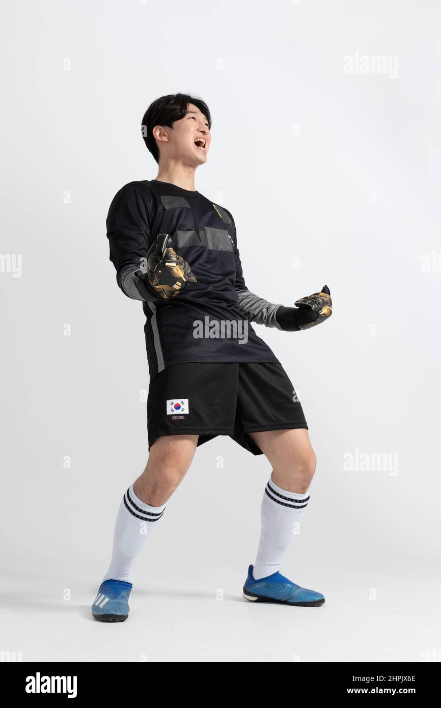 soccer football sports player, asian korean man with motions in studio ...