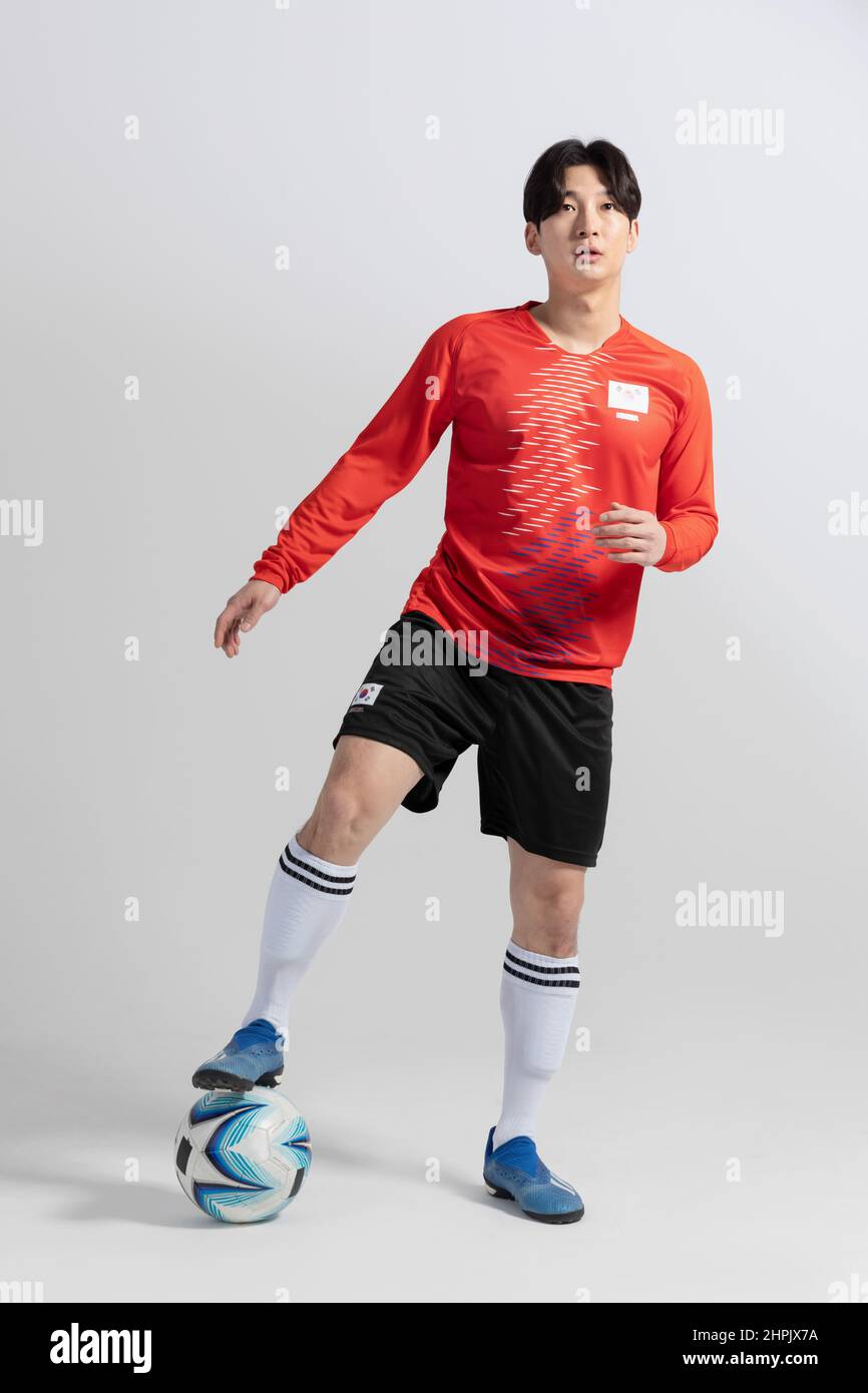 soccer football sports player, asian korean man with motions in studio ...